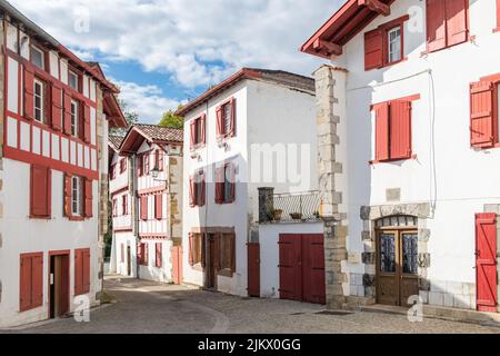 Typical houses in the village of Espelette in the Basque country ...