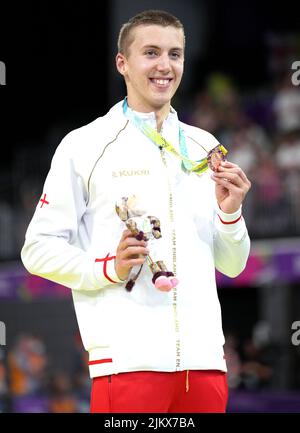 England's Luke Thomas Turley celebrates with the bronze medal after the ...