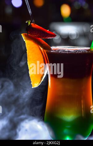 A vertical closeup of a fruit cocktail with steam Stock Photo - Alamy