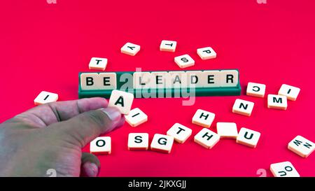 Be a leader is a motivational quote with selective focus on the word ...