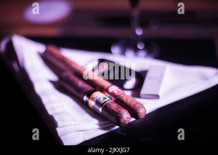 Closeup photo of many cigars on the table Stock Photo - Alamy