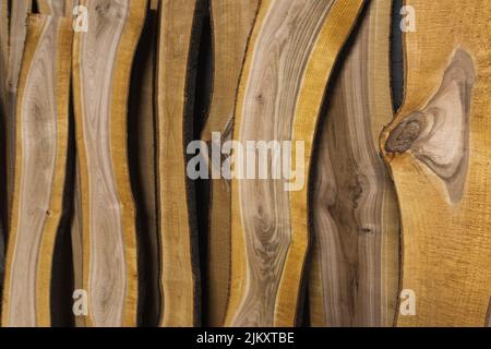 A closeup of cut wooden planks leaning vertically Stock Photo - Alamy