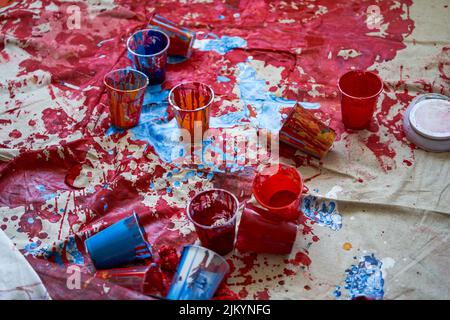 Watercolor painter's workbench and messy color paints Stock Photo - Alamy