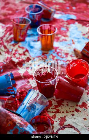 Watercolor painter's workbench and messy color paints Stock Photo - Alamy