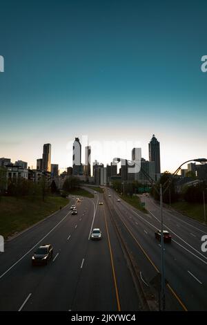 A vertical shot of an Atlanta city skyline at sunset in Georgia, USA ...
