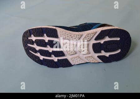under the soles of running shoes after use Stock Photo - Alamy