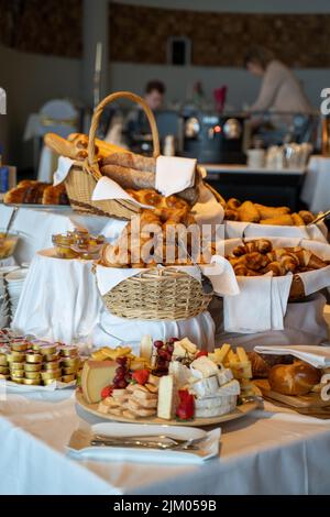 A vertical closeup shot of a plate full of Vietnamese food at a ...