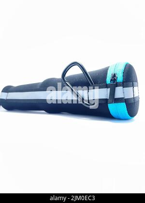 A mobile external metal telescope and it's cover on a white background ...