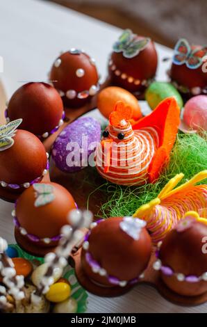 A vertical closeup shot of a brown rabbit in a field Stock Photo - Alamy