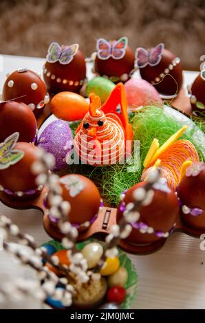 A vertical closeup shot of a brown rabbit in a field Stock Photo - Alamy