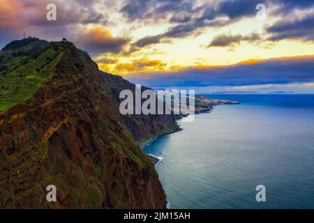 cliffs and city in background at sunset aerial photo Stock Photo - Alamy