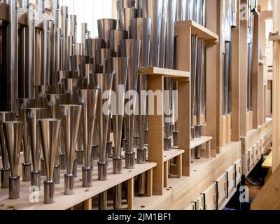 Pipe organ at Organ Hall of a Philharmonic. Steel tubes of Pipe Organ ...