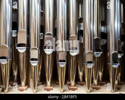 modern steel organ pipes, structure of organ, musical instrument. close ...