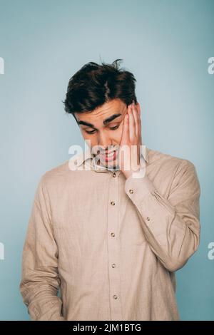perplexed confused man scratch head look owlishly Stock Photo - Alamy