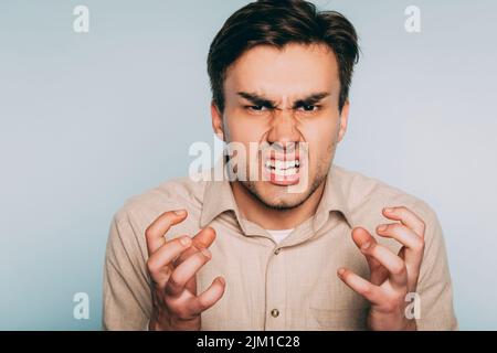 anger rage hatred infuriated man baring teeth Stock Photo - Alamy