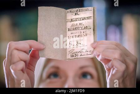 Curator Sarah Laycock with the last Charlotte Bronte miniature ...