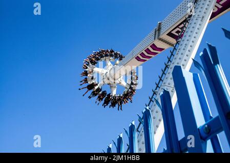 People having a ride on the Axis danger ride at Adventure Island ...