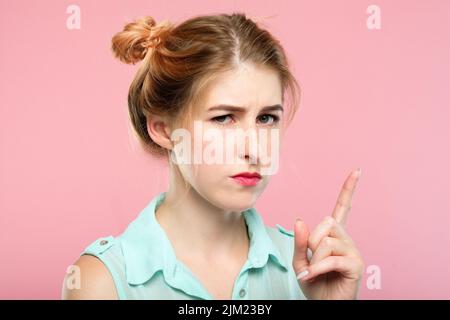 facial expression quizzical grumpy thoughtful girl Stock Photo - Alamy