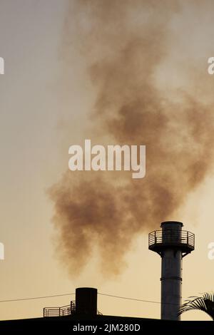 Goiania, Goiás, Brazil – August 04, 2022: Smoke coming out of a factory ...