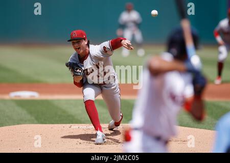 Arizona Diamondbacks starting pitcher Tommy Henry reacts after a double ...