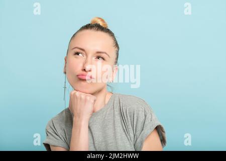 thoughtful woman pout duckface facial expression Stock Photo - Alamy