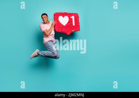 Full length photo of sweet excited woman wear yellow pullover jumping ...