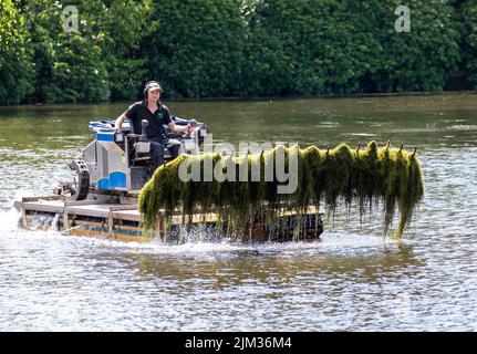 Silt removal and dredging machine from Aquatic Solutions UK in a stream ...