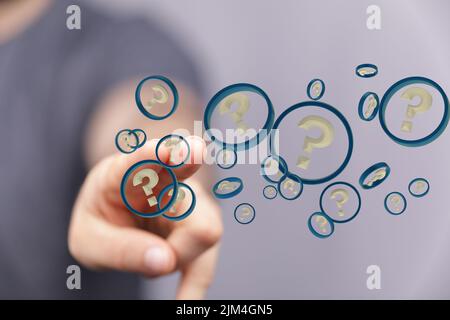 A hand pointing to the 3D rendered question marks Stock Photo - Alamy