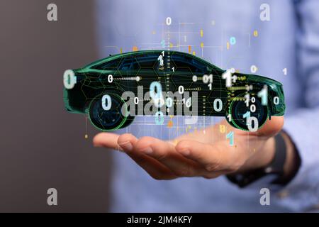 3D rendered hologram of a car and binary numbers hovering with a hand ...