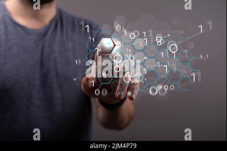 A closeup of illustrated hexagon lines with numbers near a hand Stock ...