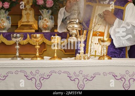 Priest Raising Host Chalice At Communion St Bernard's Church Lingfield ...