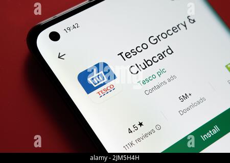 Tesco Clubcard app seen in Google Play Store on the smartphone screen ...