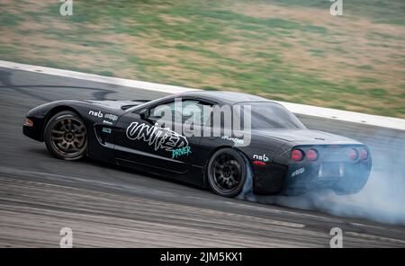 Chevrolet Corvette C5 drifting in the track Stock Photo - Alamy