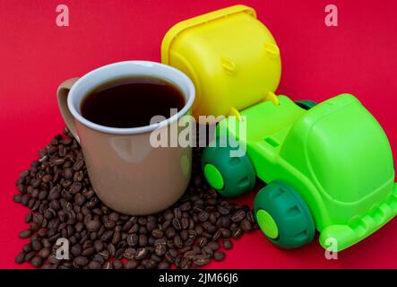 Truck transporting coffee beans and a cup of coffee. Coffee concept ...