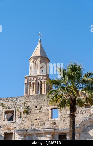 A vertical shot of the bell tower of the Diocletian's Palace in Split ...