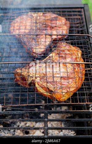 food, craft and delicious concept - cooking steak on a grill Stock ...