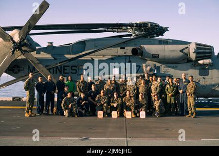 Philippine Marines pose for a group photo during KAMANDAG 6 while a U.S ...