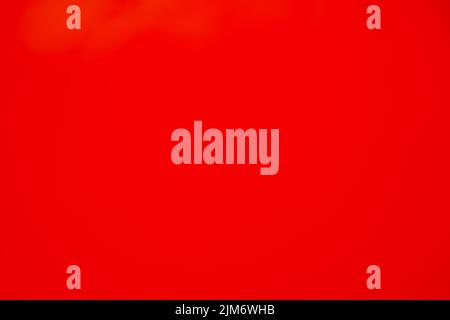A solid bright red background for wallpapers Stock Photo - Alamy