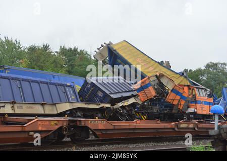 Freight wagons are standing in line at the railway station Stock Photo ...