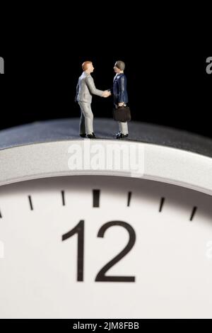 Business deal under time pressure Stock Photo - Alamy