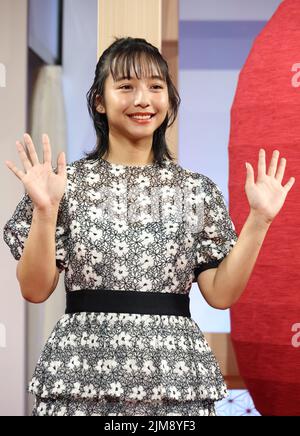 Tokyo, Japan - Japanese actress Suzu Yamanouchi displays carrot made bells at the opening ...