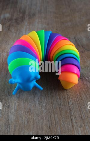 3D articulated fidget toy slug shape Stock Photo - Alamy