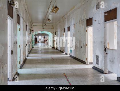 Long corridor inside Trans-Allegheny Lunatic Asylum Stock Photo - Alamy