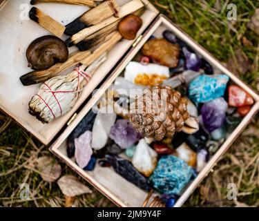 A box of colorful crystal stones for holistic ritual, importance of ...