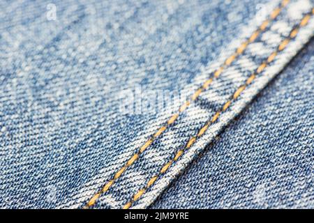 Blue and Yellow Denim with stitching Stock Photo - Alamy