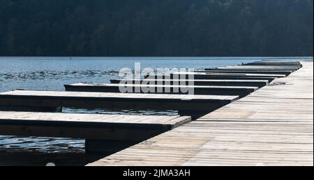 Empty boat docks and moorings after boats are removed Stock Photo - Alamy