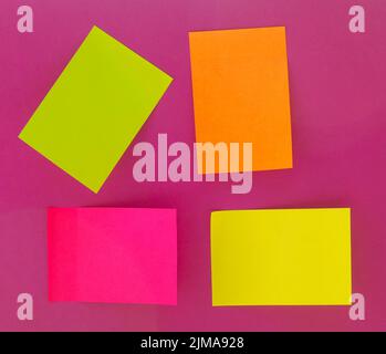 Sticky notes on violet background. Update concept Stock Photo - Alamy