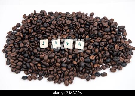 JAVA white cube text on coffee beans background Stock Photo - Alamy