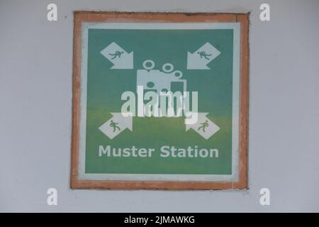 Cruise ship Muster station emergency sign for guest and crew togeather ...