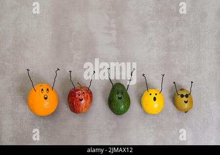 Great concept of healthy eating, diverse fruits with happy faces and ...